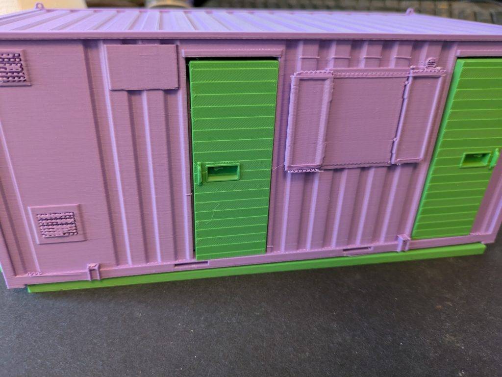 portable building kit containing doors and base